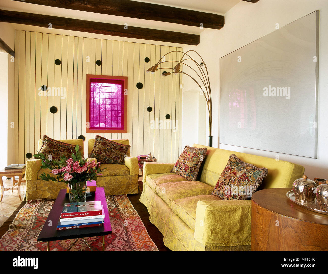 Yellow sitting room upholstered sofa floral hi-res stock photography ...