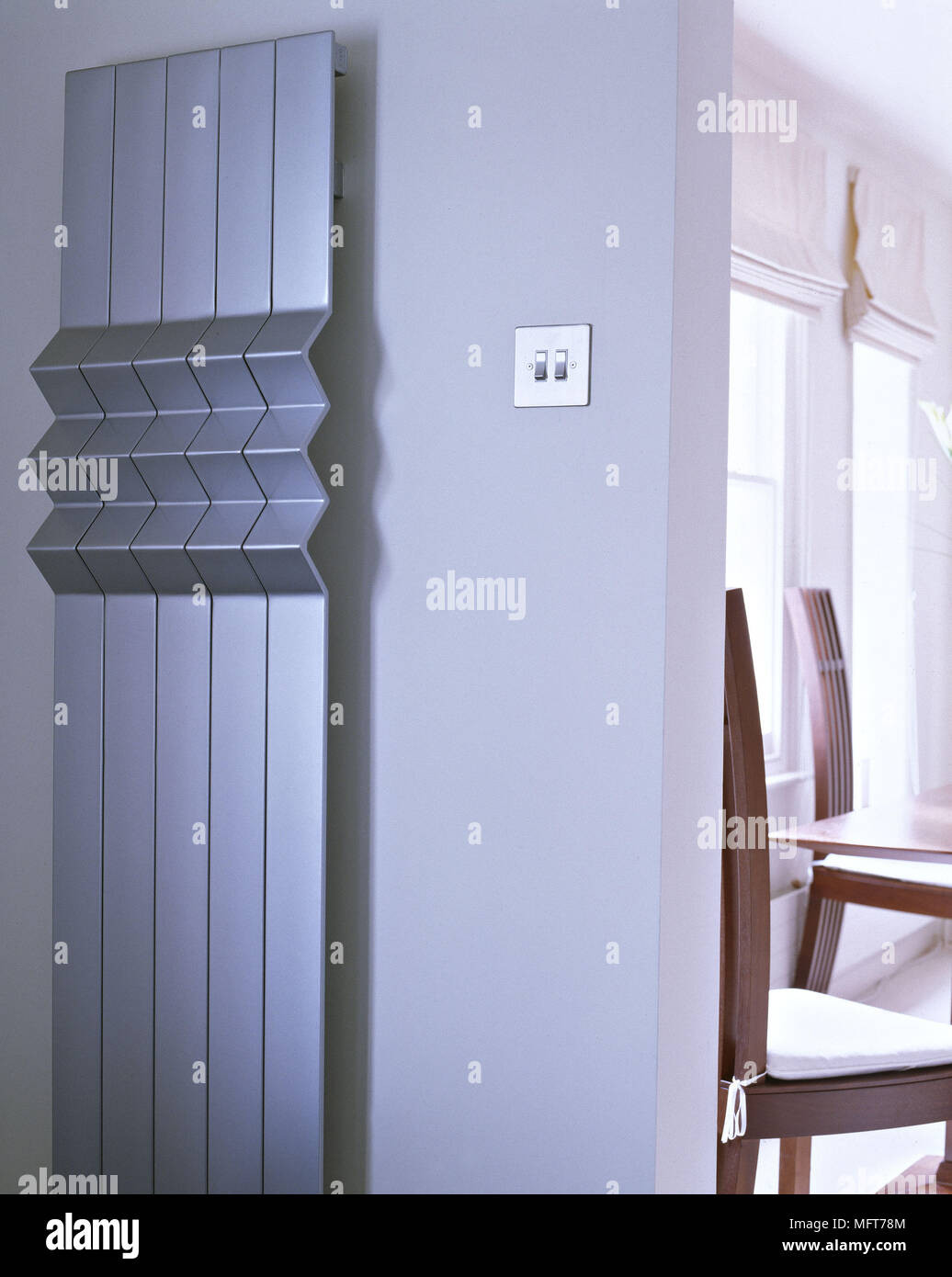 A detail of a modern room vertical radiator Stock Photo - Alamy