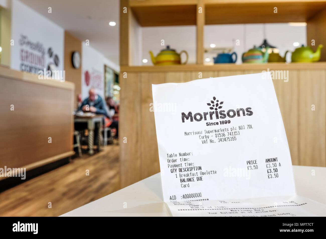 Receipt (for a breakfast omelette) placed on a table at the Morrisons ...