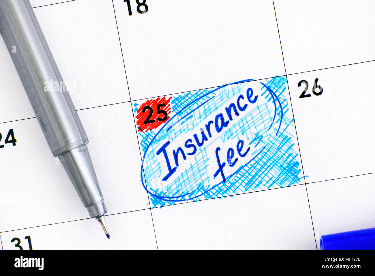 Reminder Insurance Fee in calendar with blue pen. Close-up Stock Photo ...