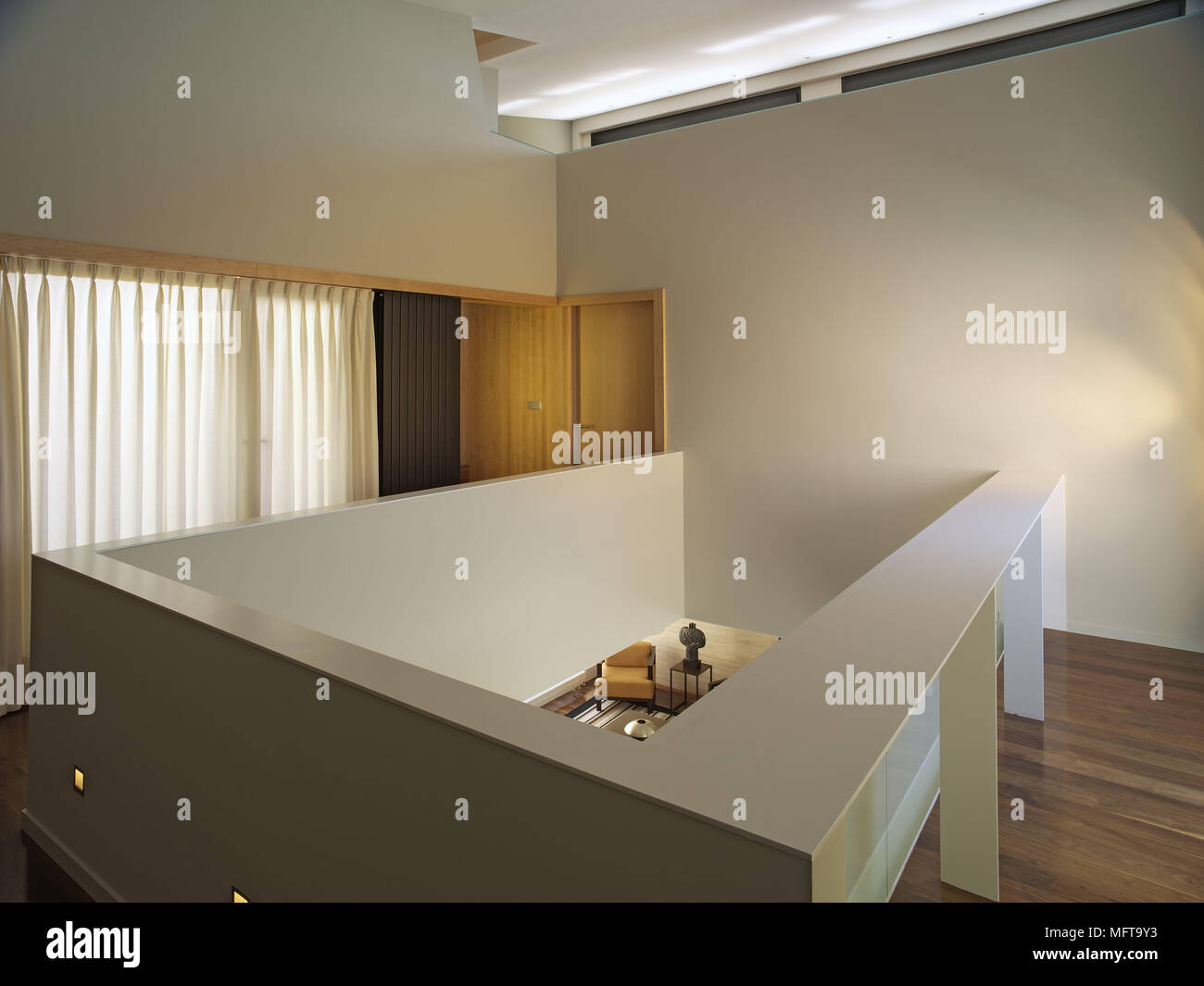 Elevated view of upper landing with room below Stock Photo - Alamy