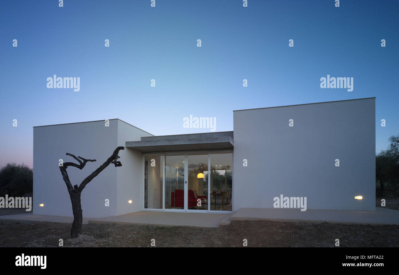 Exterior of modern house with terrace at night Stock Photo - Alamy