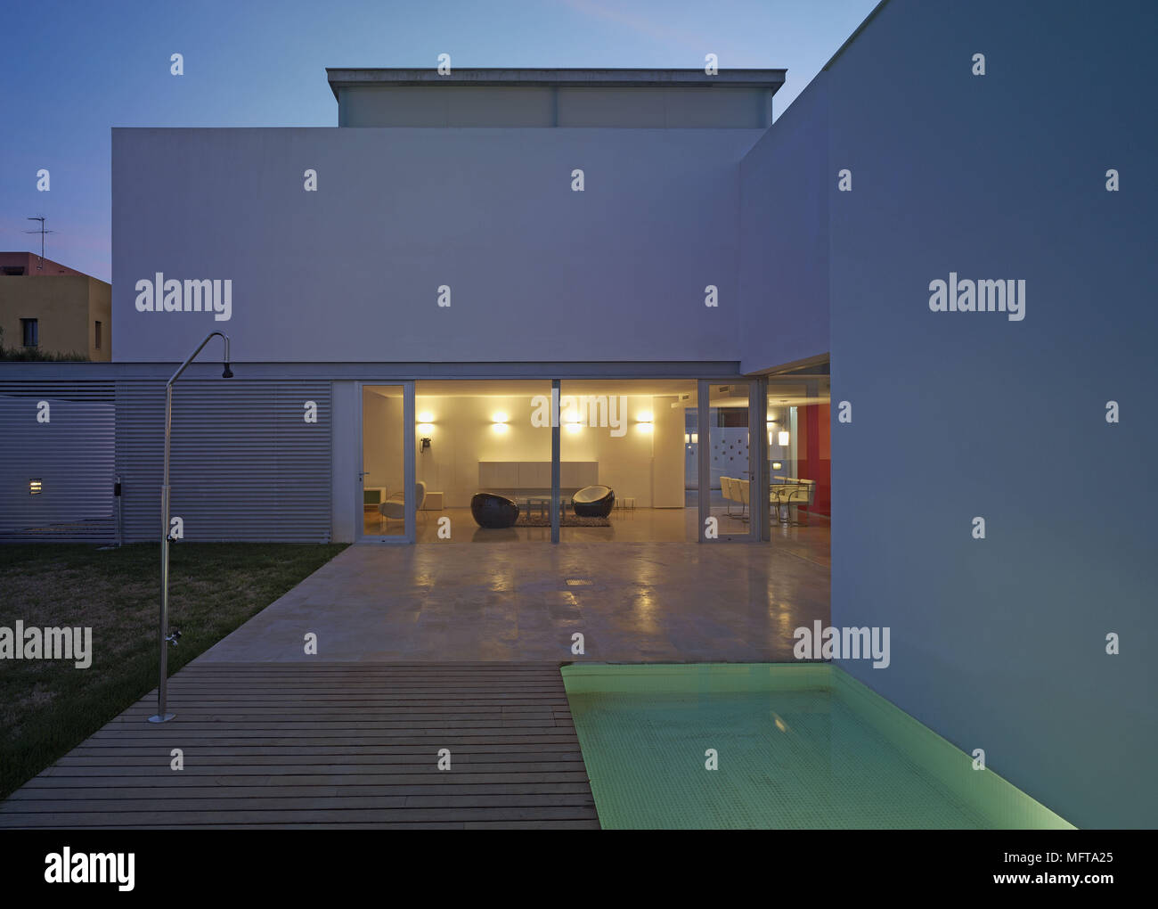 Exterior of modern house with terrace at night Stock Photo - Alamy