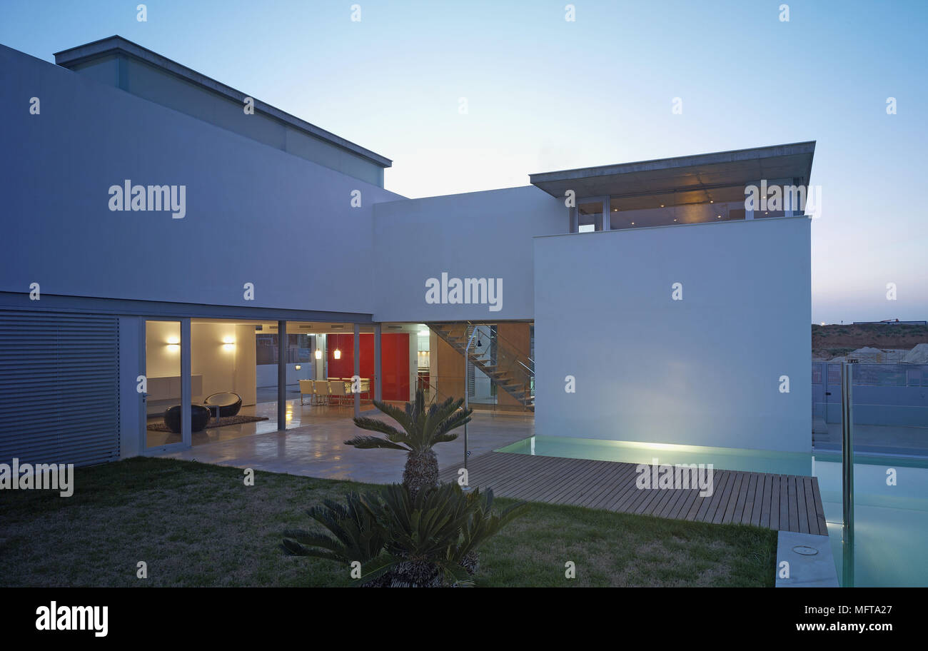 Exterior of modern house with terrace at night Stock Photo - Alamy
