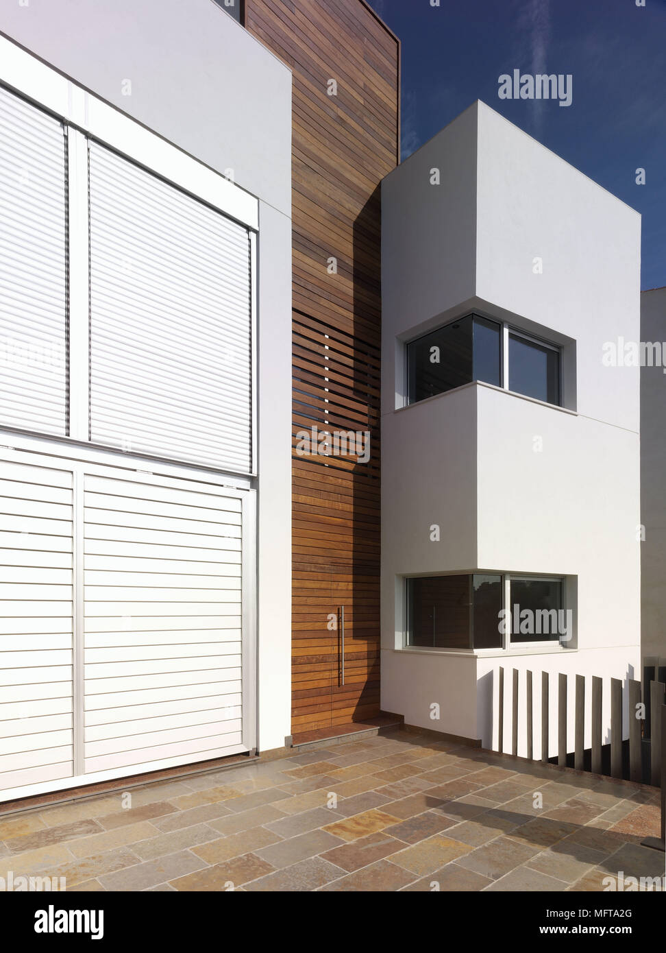 Exterior of modern whitewashed house Stock Photo - Alamy