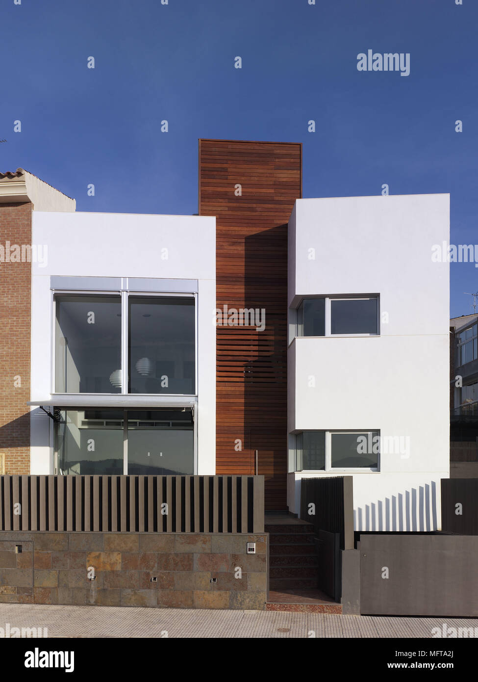 Exterior of modern whitewashed house Stock Photo - Alamy