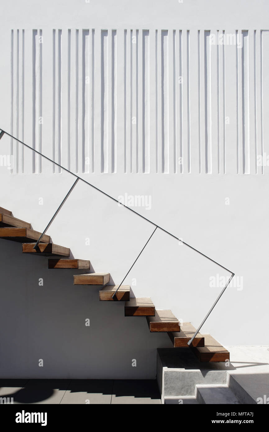 Outside staircase with wooden treads and steel banister Stock Photo - Alamy