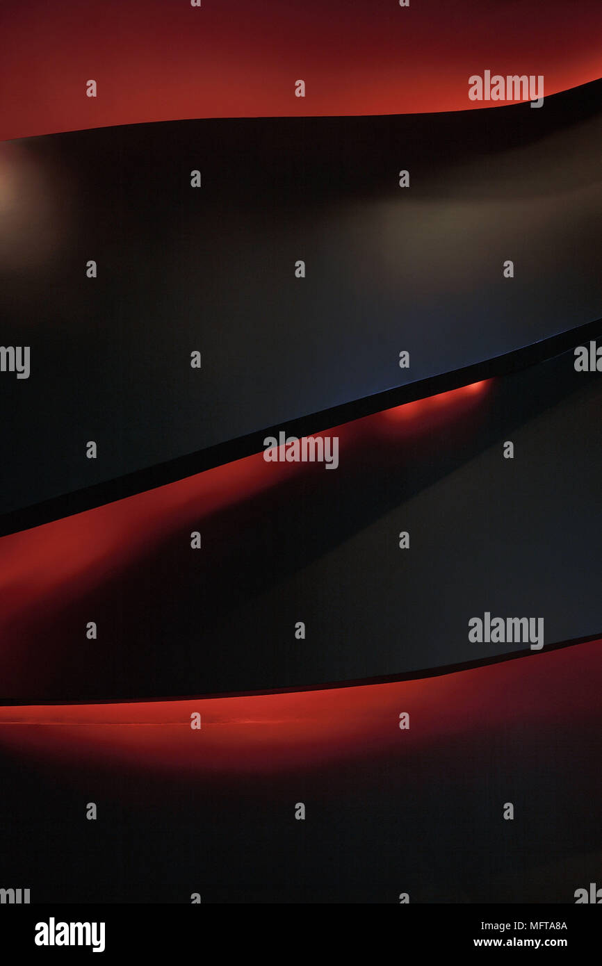 Red lighting on panelled wall feature of bar interior Spain Stock Photo ...