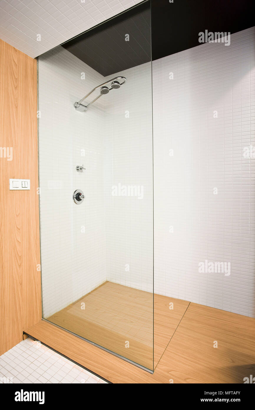 Modern shower area with wooden floor Stock Photo - Alamy