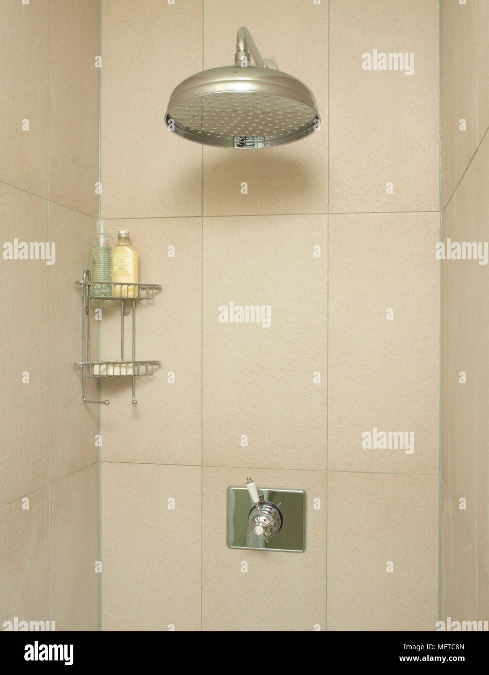 Tile shower cubicle with chrome shower head tap fitting Stock Photo - Alamy