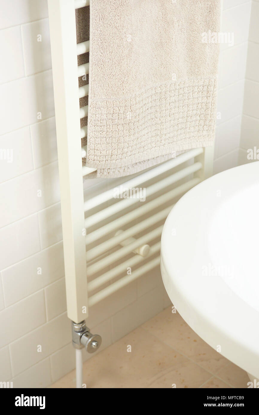 White towel rail radiator Stock Photo - Alamy