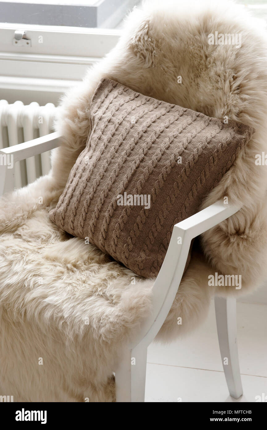 Textured cushion on chair Stock Photo - Alamy
