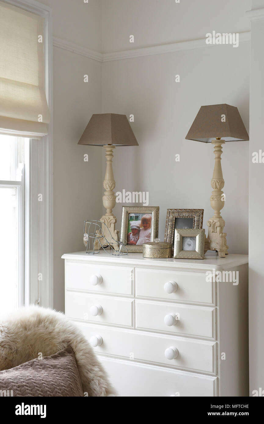 Chest of drawers in traditional style bedroom Stock Photo - Alamy