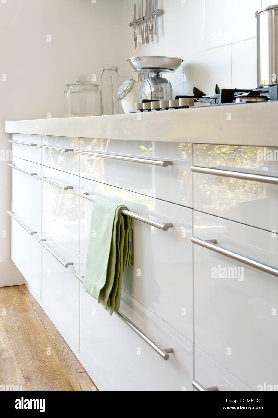 Modern kitchen with white fitted units Stock Photo - Alamy