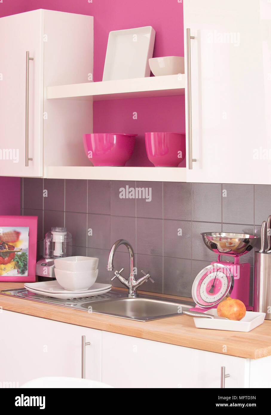 Modern kitchen with white fitted units Stock Photo - Alamy
