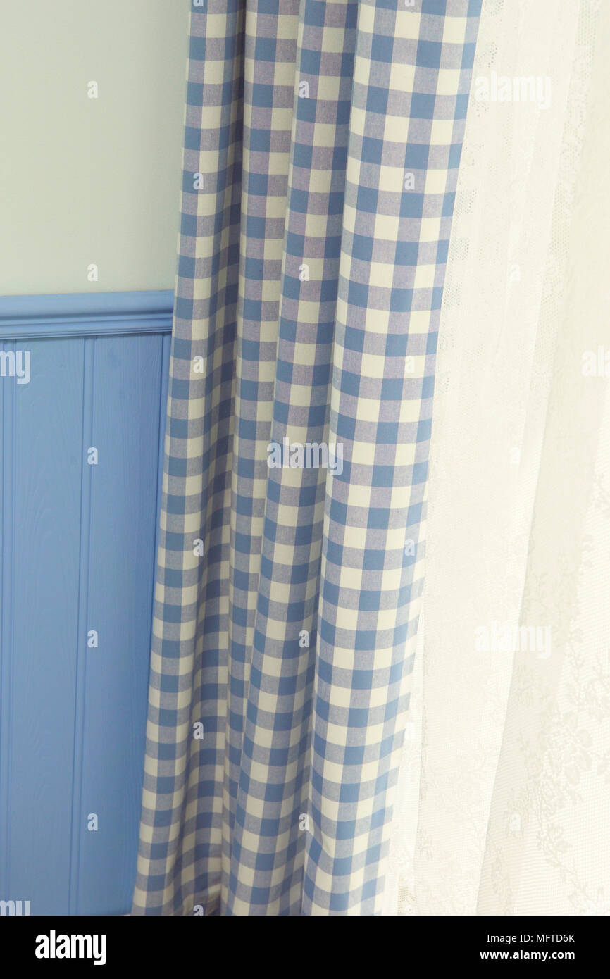 Blue and white check curtain Stock Photo - Alamy