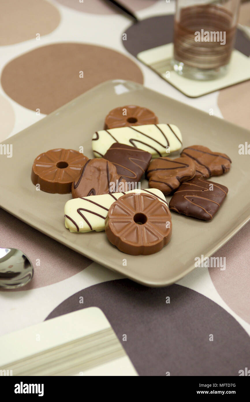 Biscuits with plate hi-res stock photography and images - Alamy