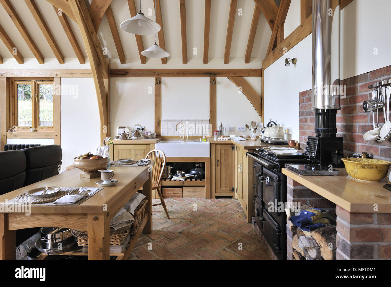 Breakfast table in country style kitchen Stock Photo - Alamy