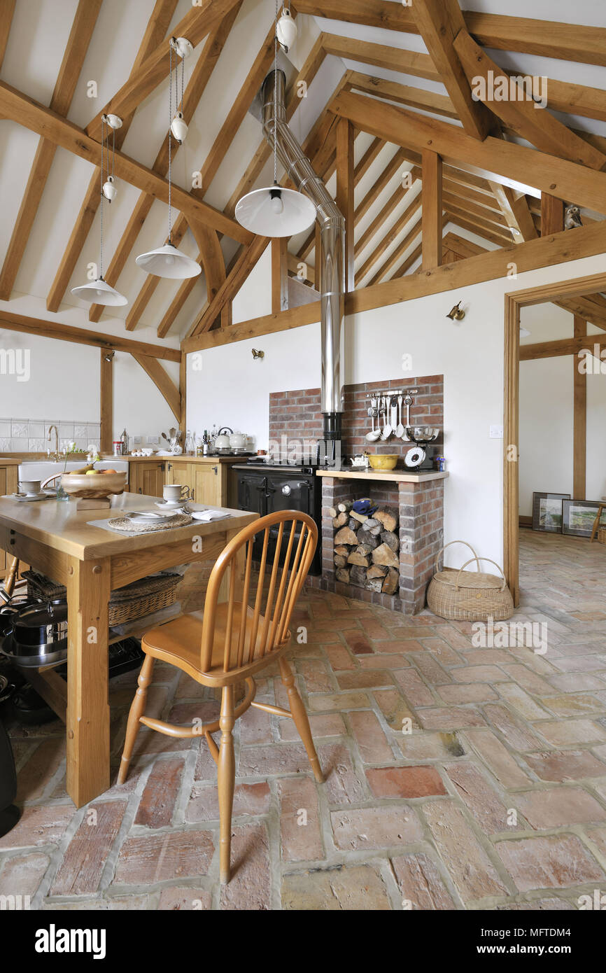 Breakfast table in country style kitchen Stock Photo - Alamy