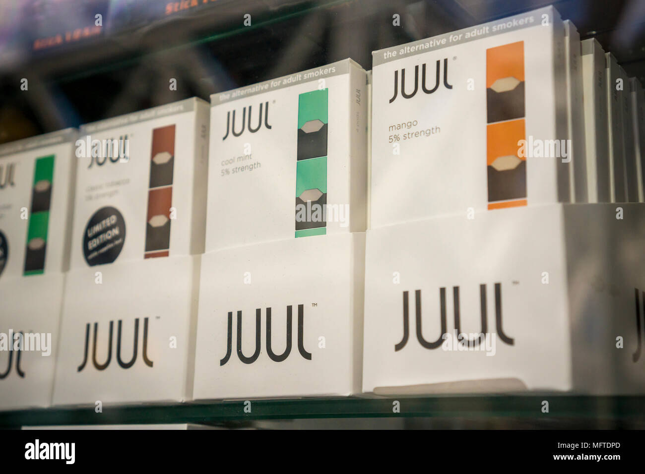 A selection of the popular Juul brand vaping supplies on display in the ...