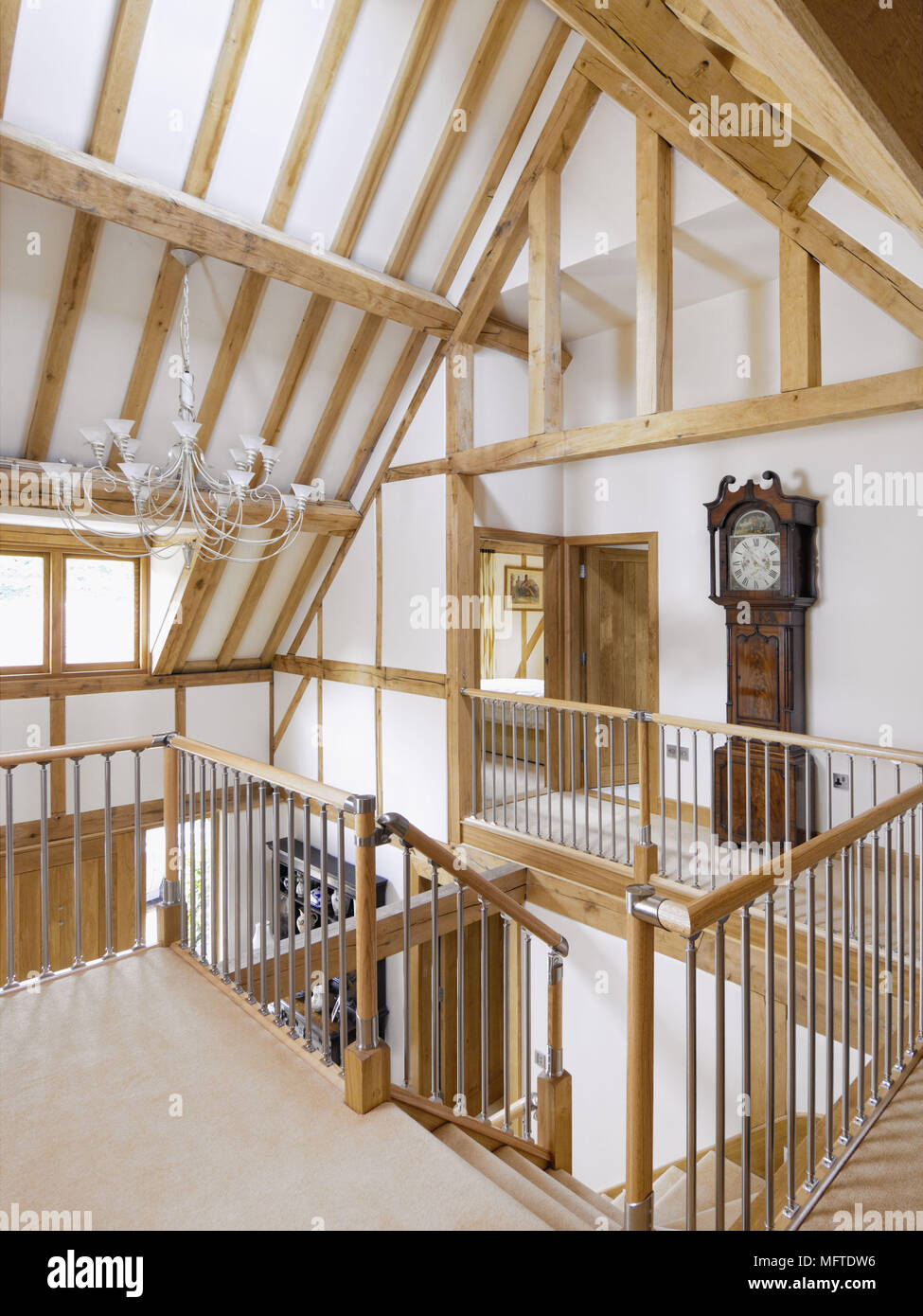 Landing in modern country style hallway Stock Photo - Alamy