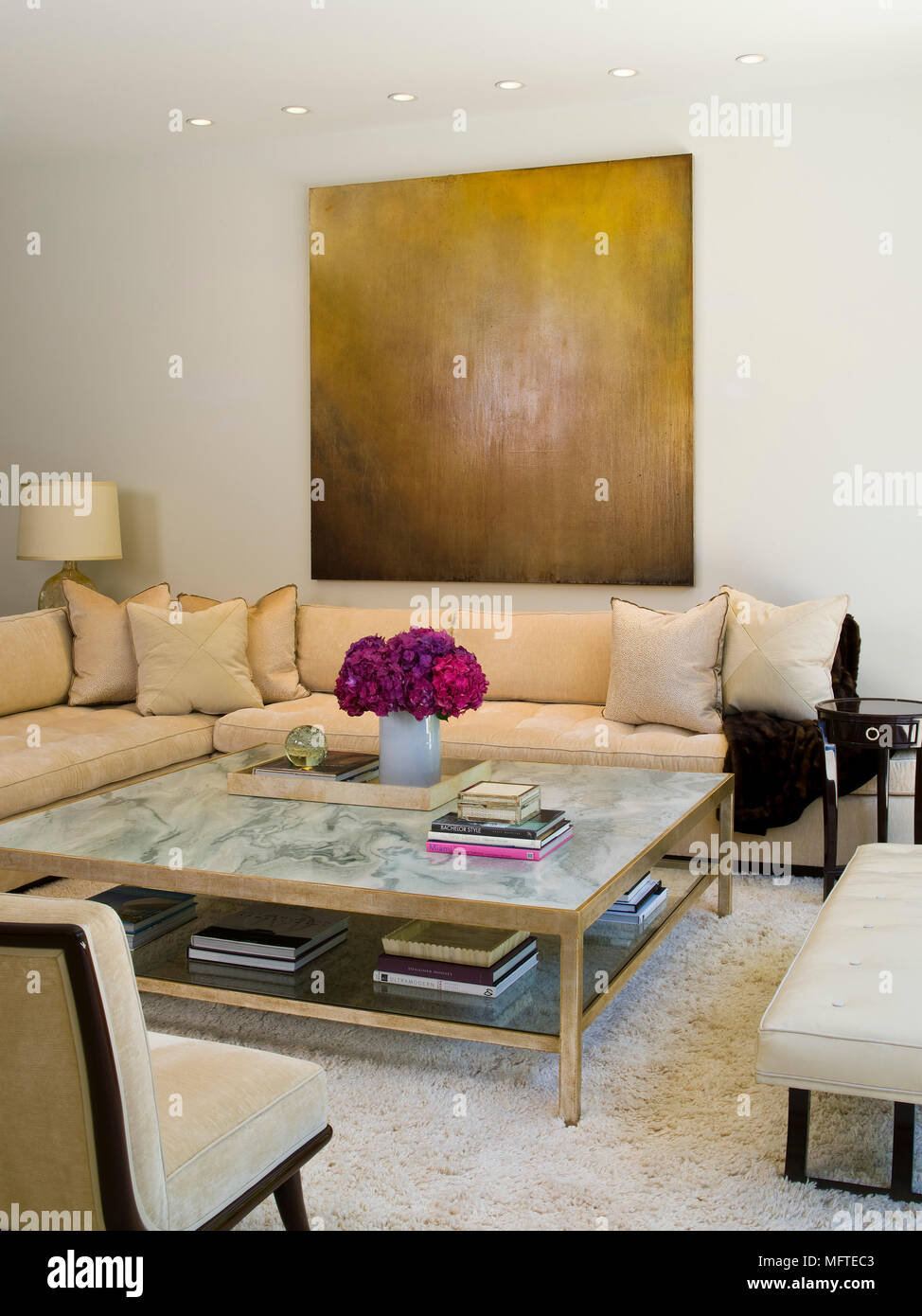 Upholstered seating around coffee table in modern sitting room Stock ...