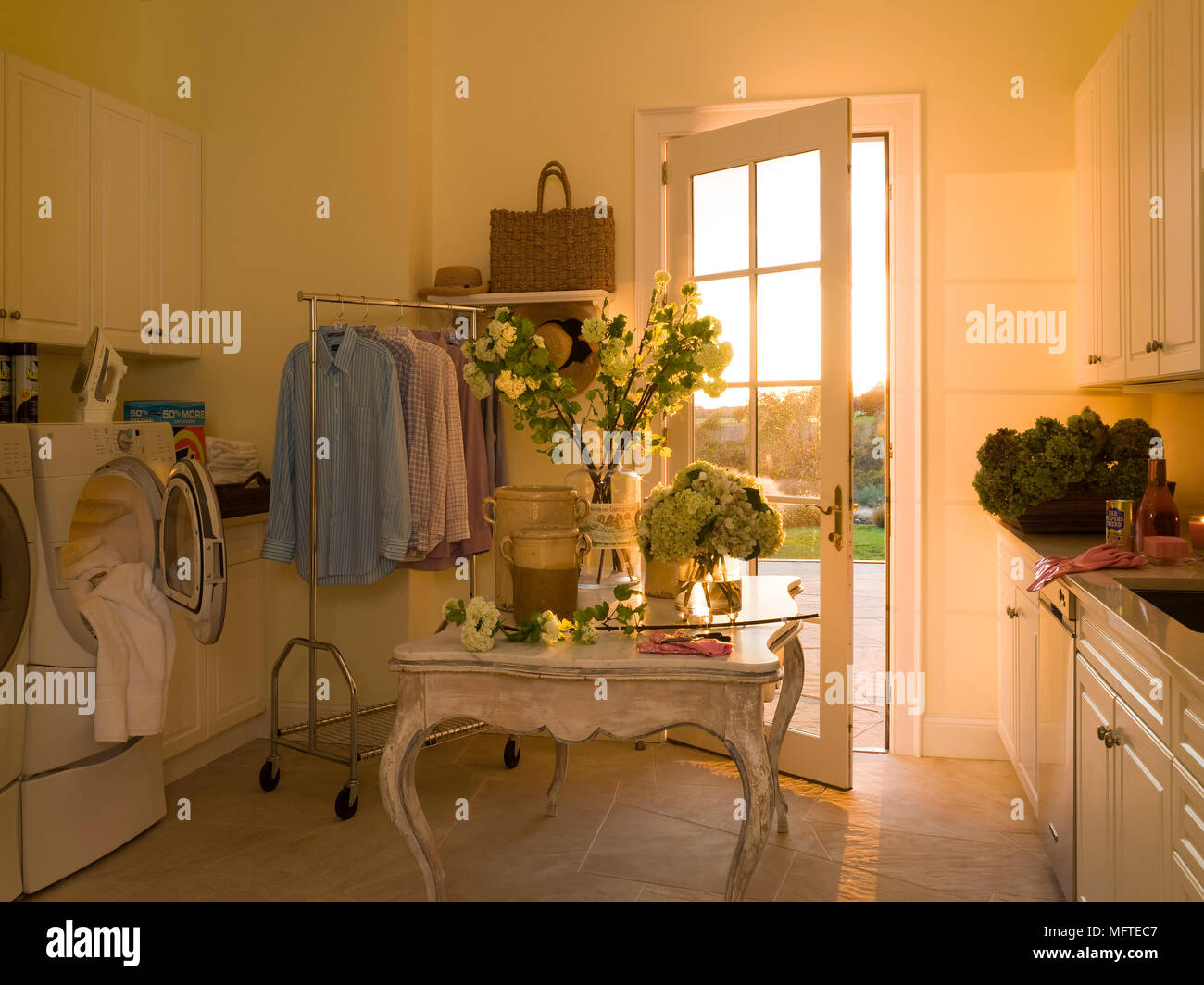 Utility room with washing machine Stock Photo - Alamy