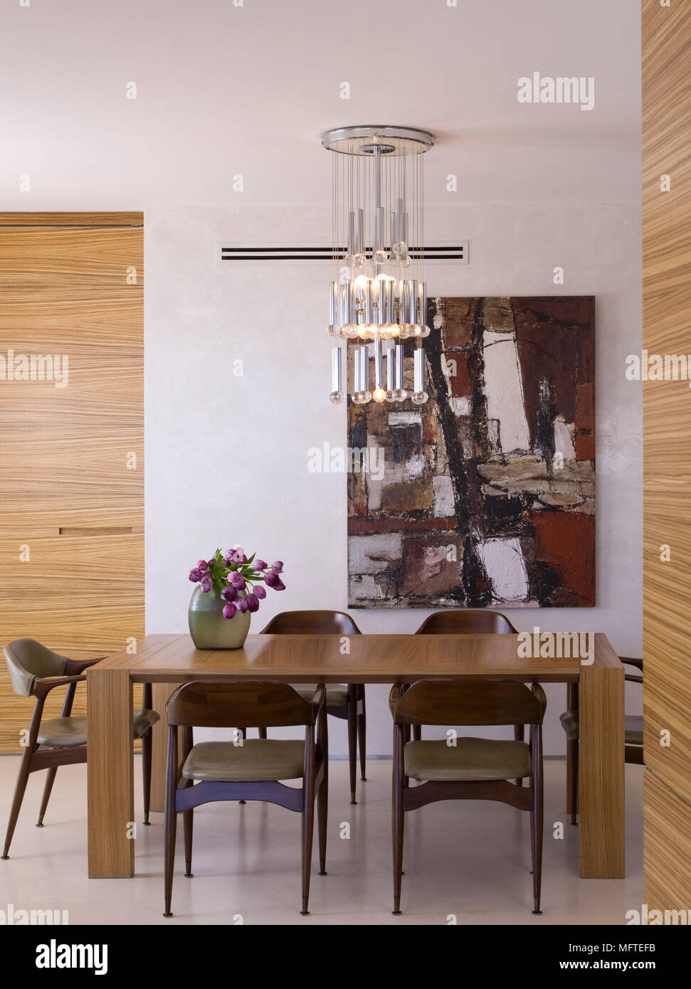 Pendant light above wooden dining hi-res stock photography and images ...