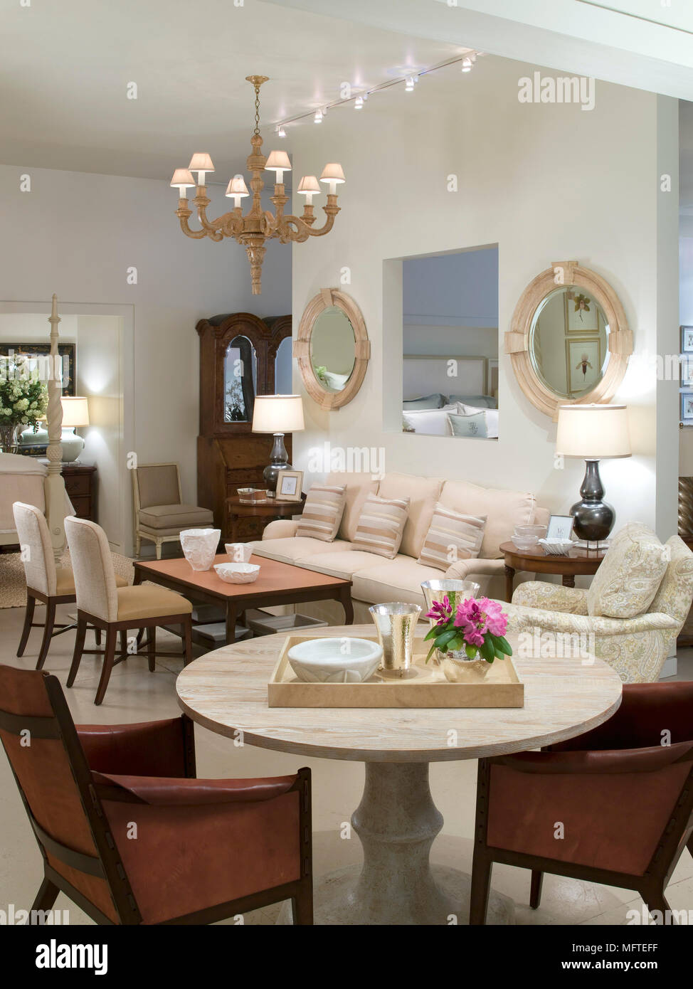 Upholstered seating around coffee table in sitting room Stock Photo - Alamy