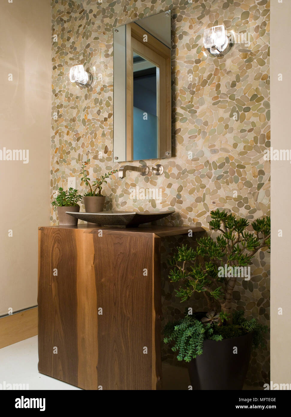 Square washbasin set in cupboard unit in modern bathroom Stock Photo ...