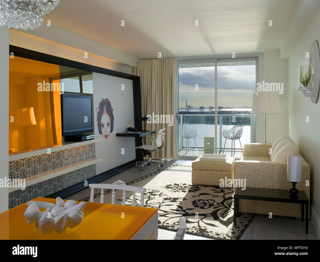 Modern open plan room with sitting area and office area in corner Stock ...