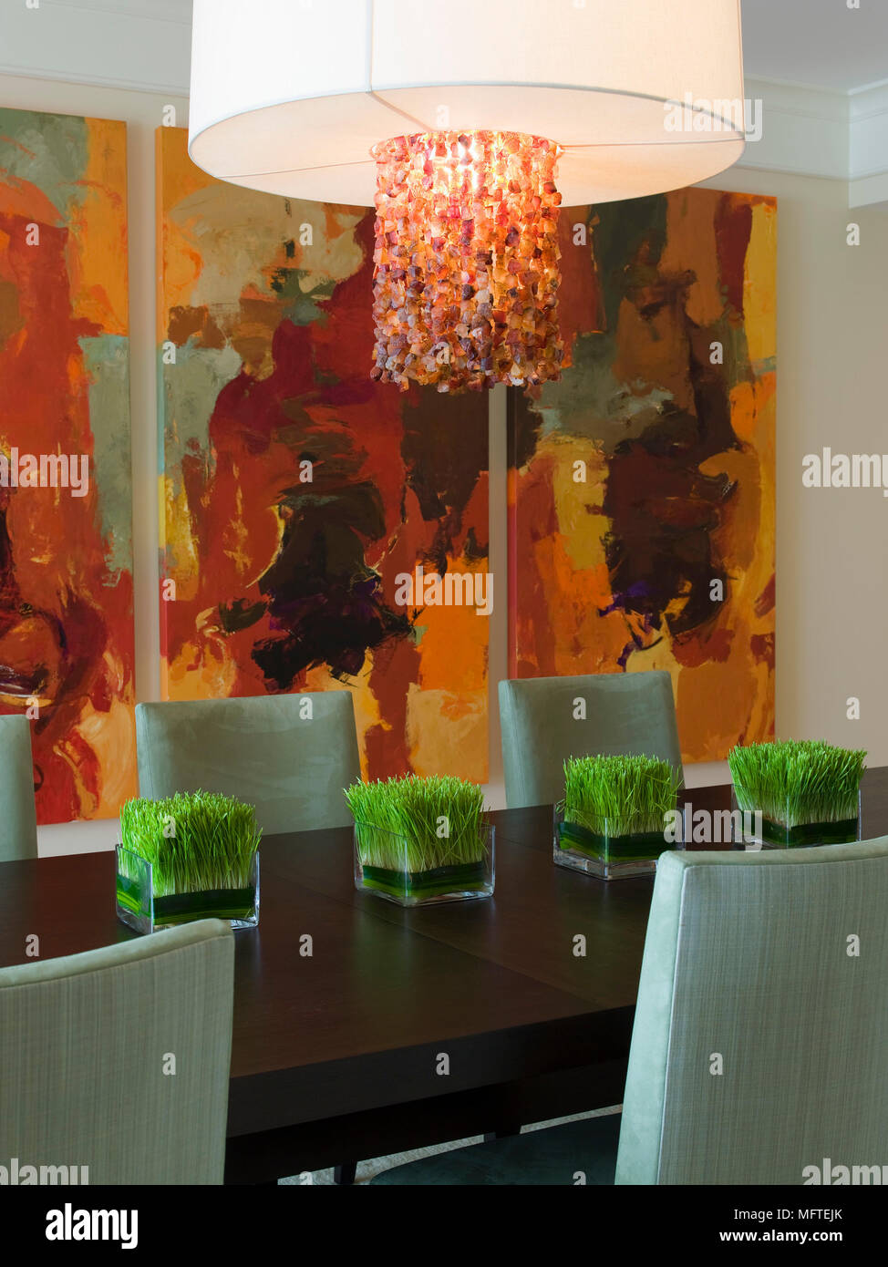Ceiling light above table in modern dining room Stock Photo - Alamy