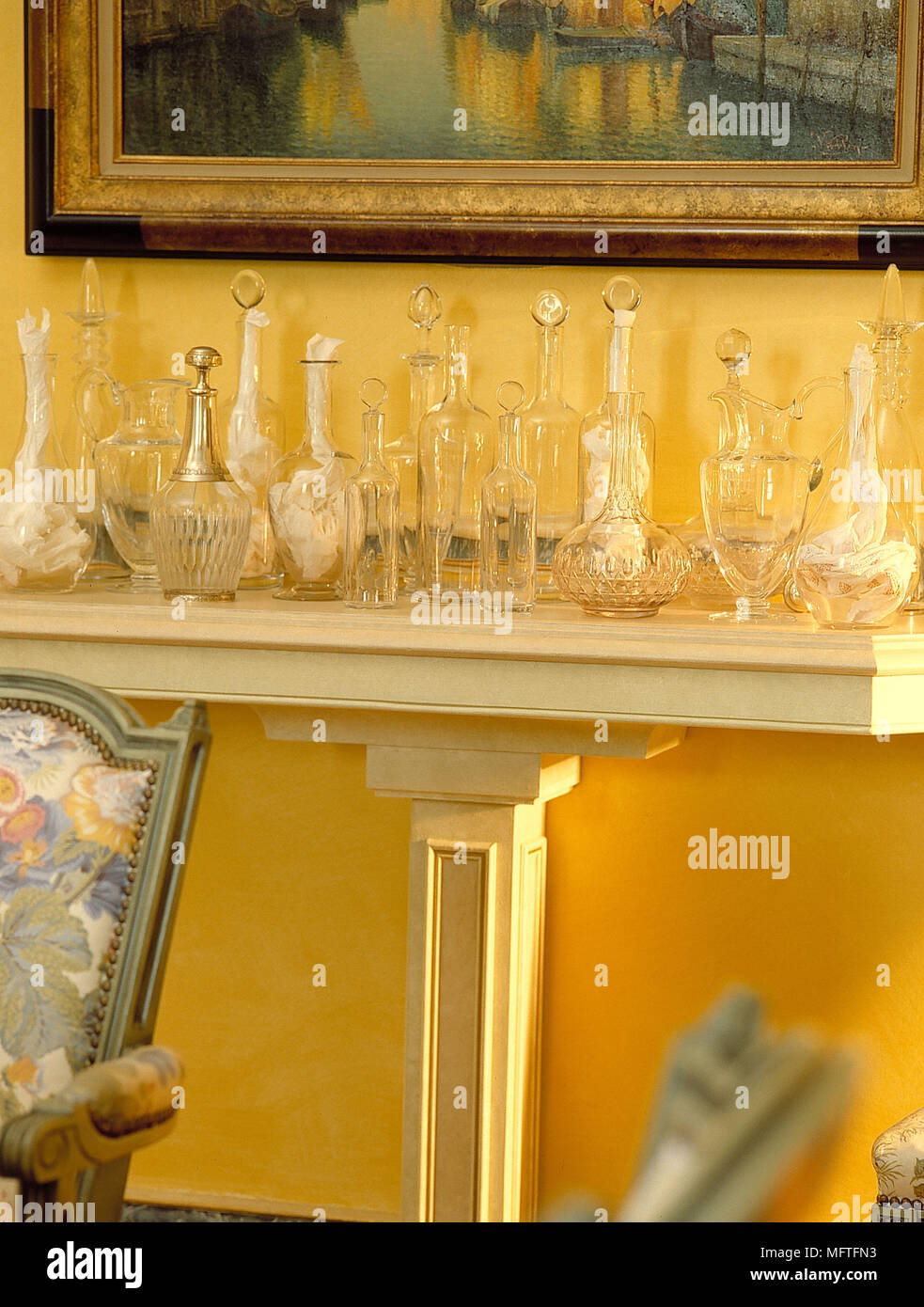 Side table with collection of decanters Stock Photo - Alamy