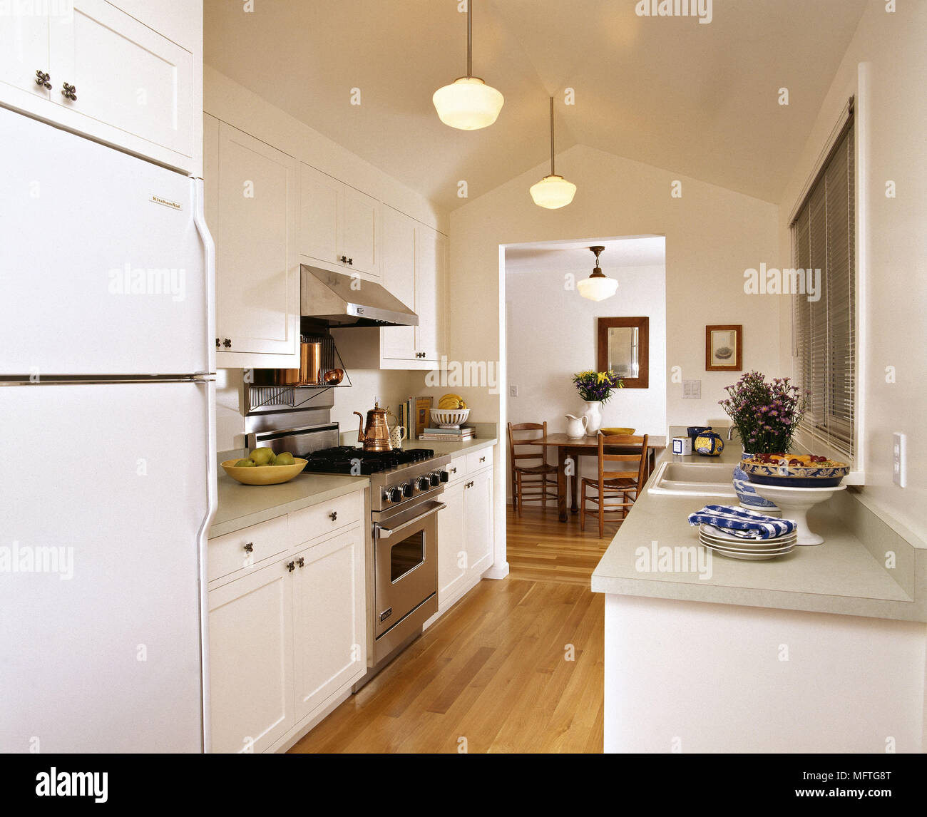 Modern kitchen white units wood floor interiors kitchens neutral Stock ...