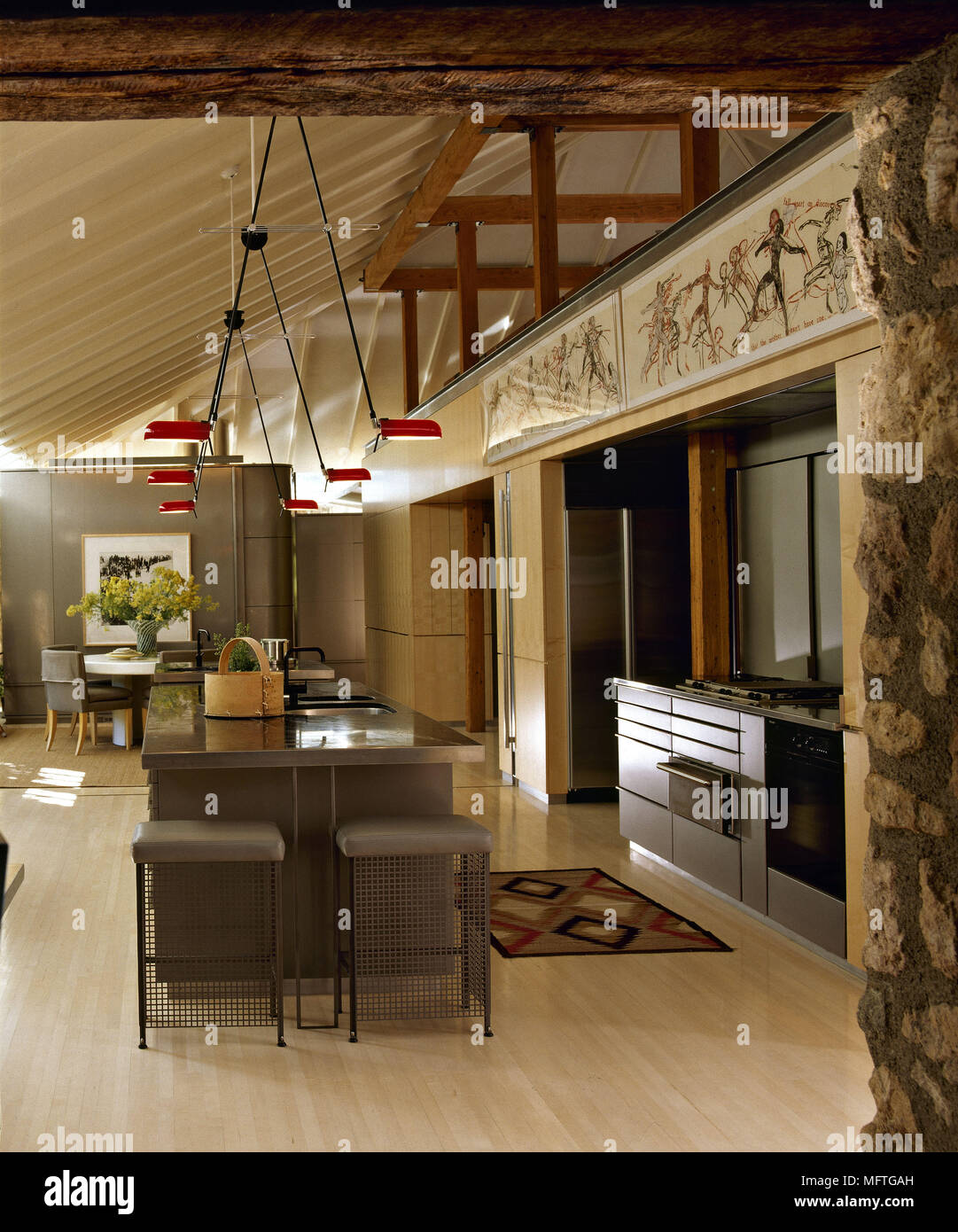 Modern open plan kitchen and dining area with central island unit Stock ...