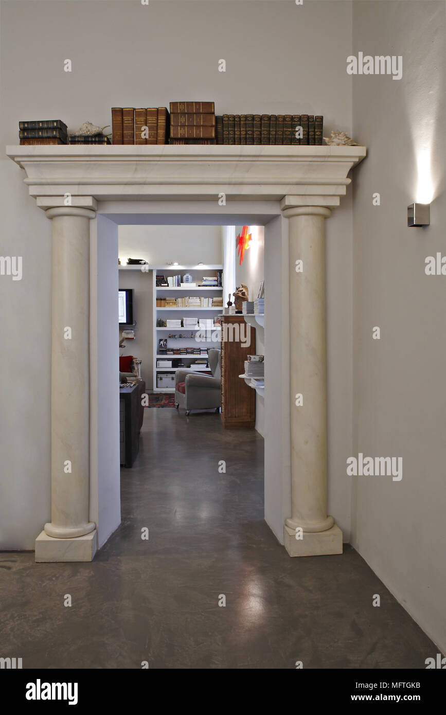 View through open doorway decorated with fake pillars Stock Photo - Alamy