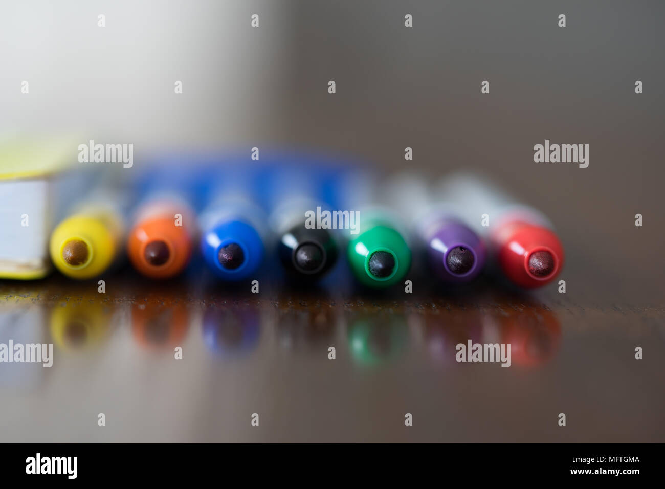 Collection of Colored Markers with Yellow notebook Stock Photo - Alamy
