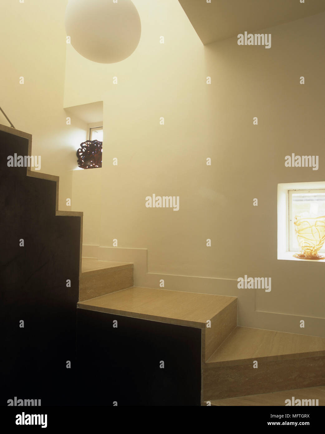 Staircase with vases in square alcoves and ceiling light Stock Photo ...