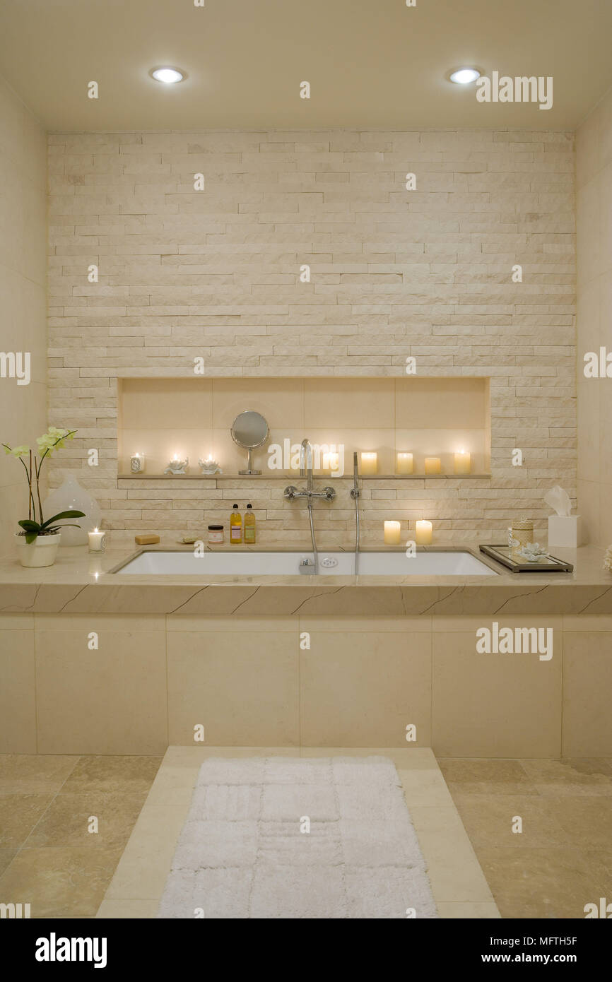 Built in bathtub set in recess in modern bathroom Stock Photo - Alamy