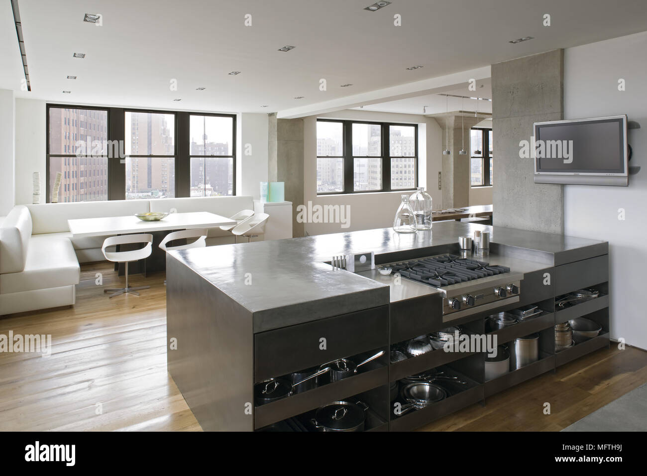 Hob set in unit in modern open plan kitchen with dining area Stock ...