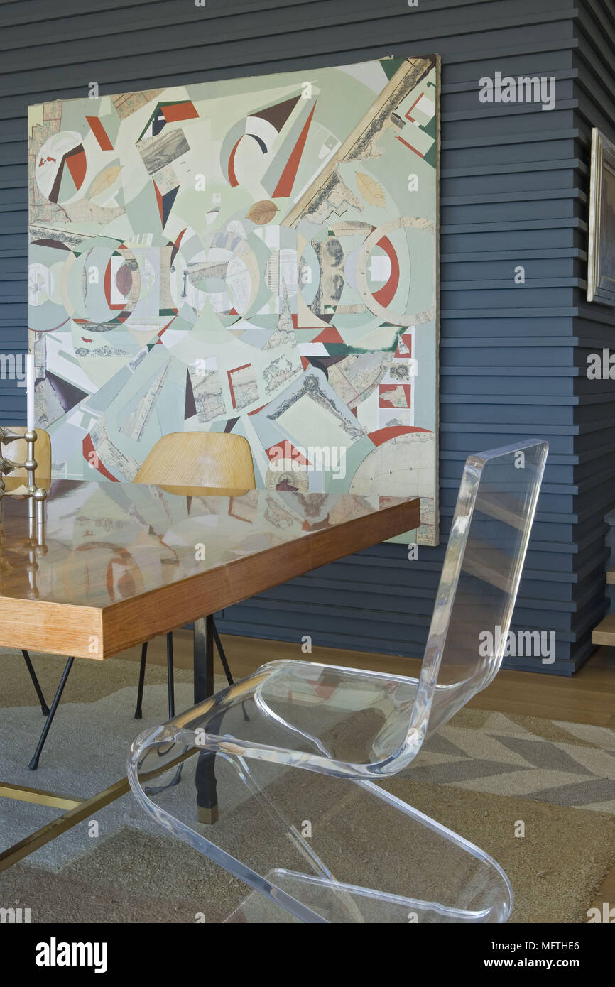Transparent plastic chair in modern dining room Stock Photo - Alamy