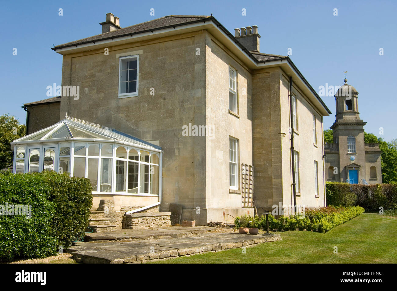 Exterior of detached country house with new build conservatory Stock ...