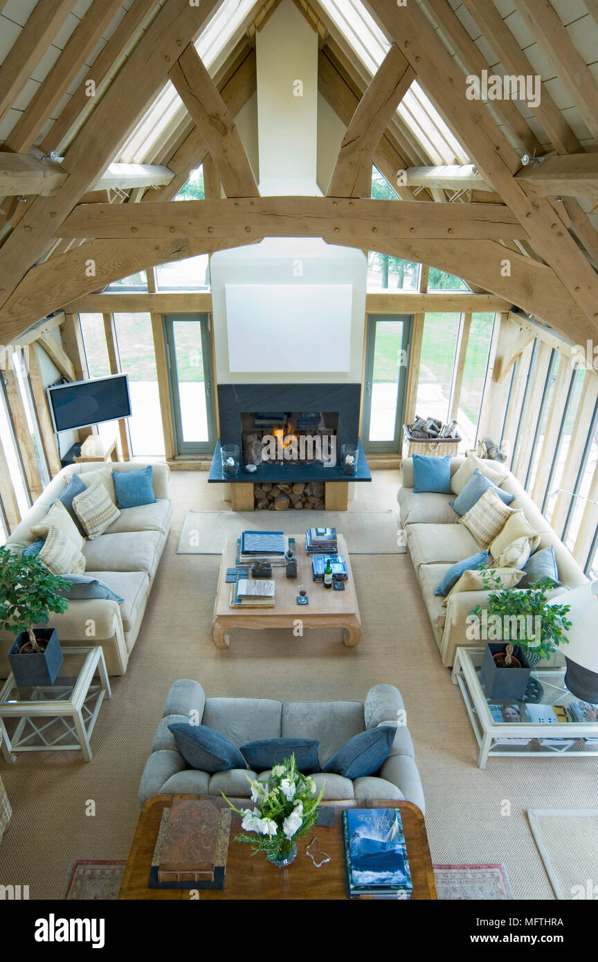 View from above looking down on sitting room with sofas facing coffee ...