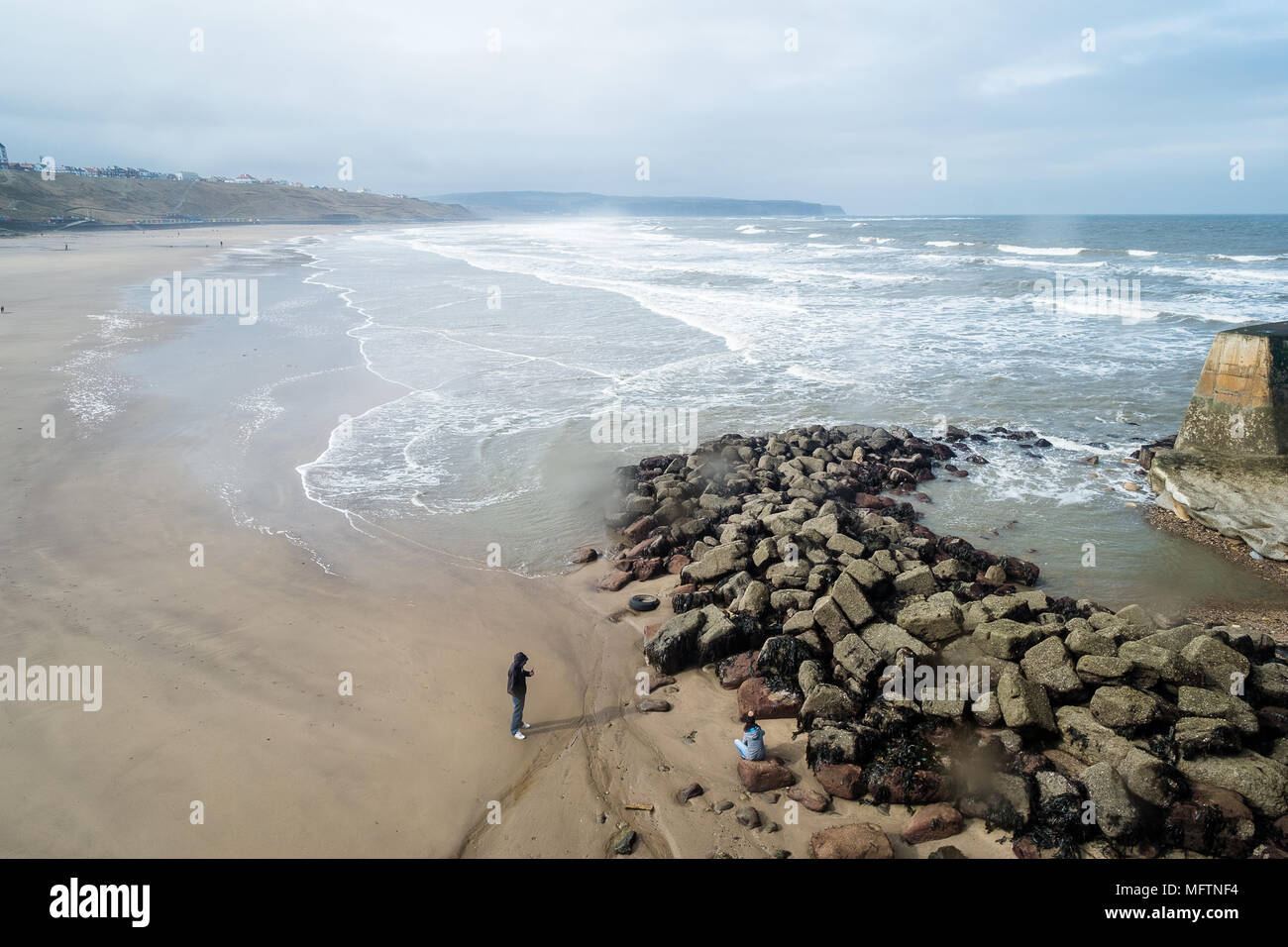 Whitby beach, from Whitby pier, North Yorkshire, UK Stock Photo - Alamy