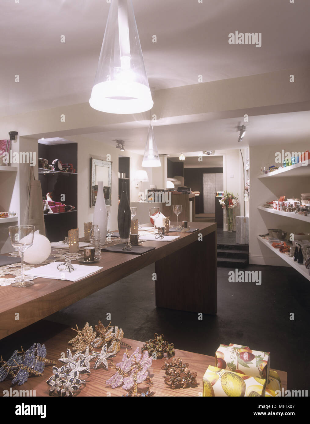 Interior of a shop with various items on shelves and tables Stock Photo ...