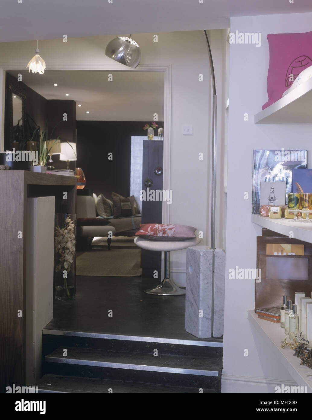 Interior of a shop with stairs leading up to another level Stock Photo ...