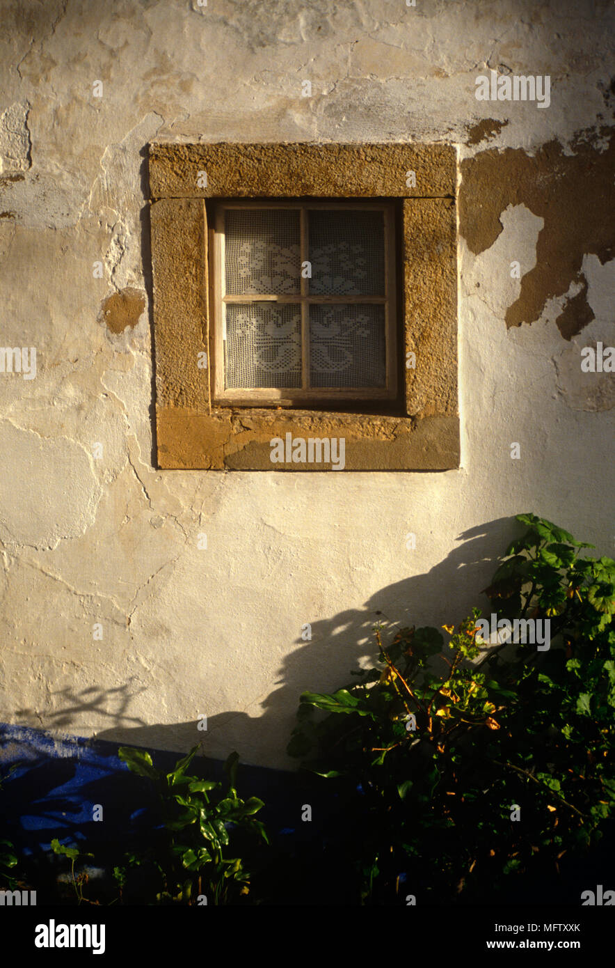 Rustic window in stone wall Stock Photo - Alamy