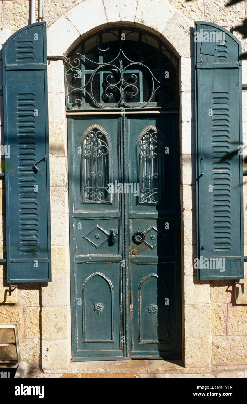 Exterior of green painted door and shutters in the German Templar house ...