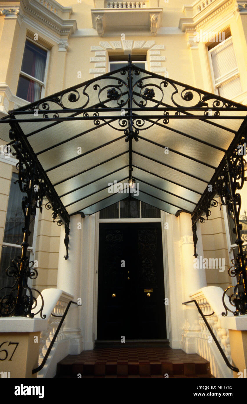 Cast iron canopy over Georgian front door Stock Photo - Alamy