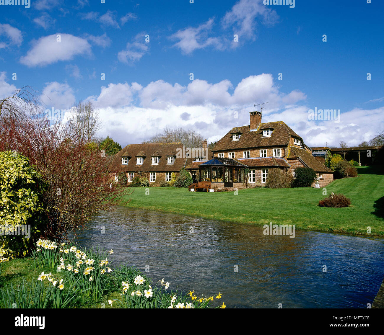 An exterior of a detached riverside country house Stock Photo - Alamy